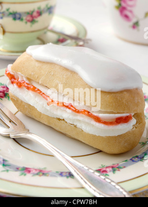 iced finger frosted bun cream filled with jam Stock Photo - Alamy