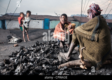 India Jharkhand Dhanbad Jharia, people pick coal at overburden dumping ...