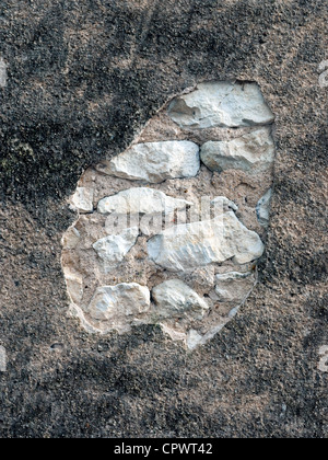 Old sand mortar rendering revealing brick wall - France Stock Photo - Alamy