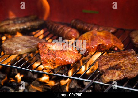 Barbecue in the garden, really tasty dinner! Stock Photo - Alamy