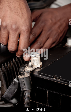 A mechanics hands working on a car Stock Photo: 101946914 - Alamy