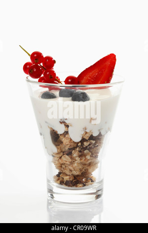 Healthy breakfast, muesli with currants, blueberries and strawberries ...