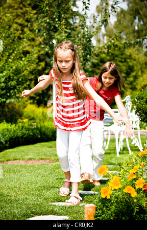 Photo of two playing girls in summer Stock Photo - Alamy