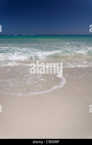 Djerba, Tunisia, beach with sea and waves, cloudy and threatening sky ...