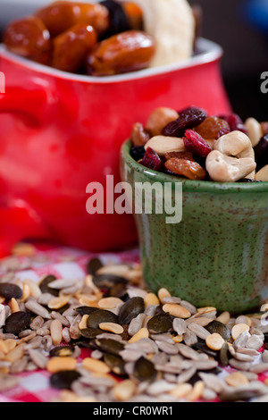 Various dried fruits and nuts on a kitchen table. Copy space Stock ...