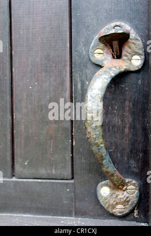 Old wooden door with wrought iron details in Gijon city, Asturias ...