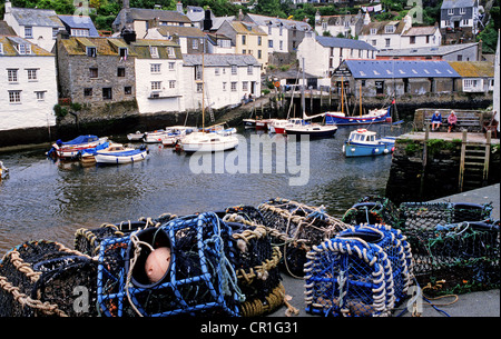 United Kingdom, Cornwall, Polperro, Fishing boats in Polperro Harbour ...