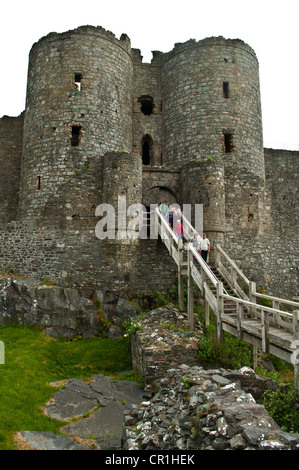 Town of Harlech, Wales. Harlech Castle gatehouse, with the Red Dragon ...