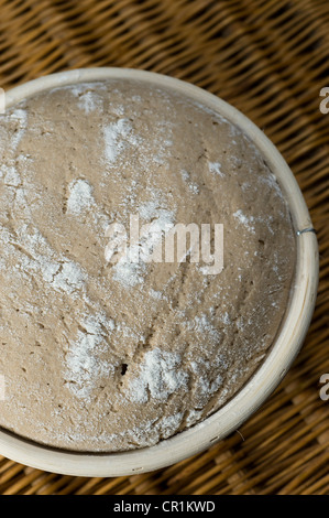 Bread dough rising in a bowl waiting to knead Stock Photo - Alamy