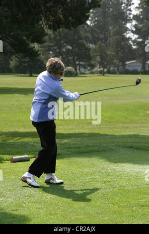 NEWPORT OREGON - 25 APR 2007 - Woman golfers heading down the fairway ...