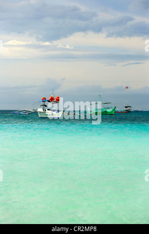 Lonely boats at open ocean. Philippines Stock Photo - Alamy