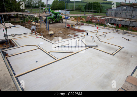 Sole plates for timber frame building laid out on foundation slab ...