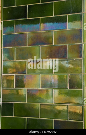 On the wall green glazed tiles as the background, the traditional ...