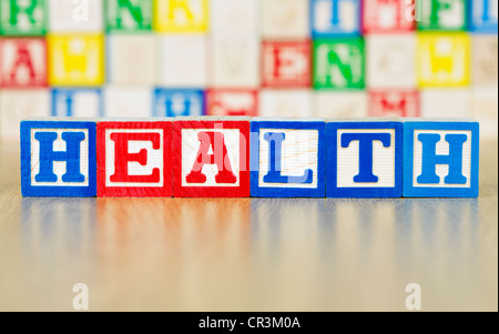 The word "health" spelled out in cereal - isolated Stock Photo - Alamy