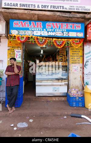Food shops in Calangute high Street Stock Photo - Alamy