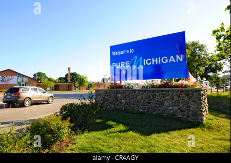 Welcome to Pure Michigan sign at the border between Michigan and ...