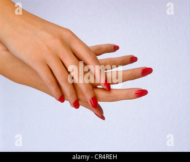 Close up shot of female hands holding a small gift Stock Photo - Alamy