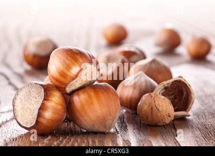 Filberts on a wooden table. Close-up shot Stock Photo - Alamy