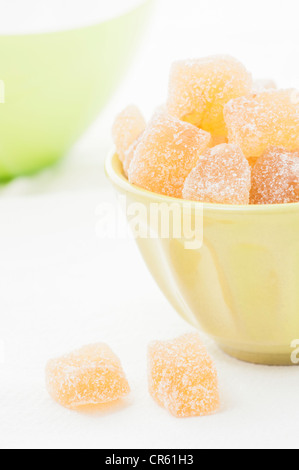 dried spices ginger in bowl on a brown background Stock Photo - Alamy