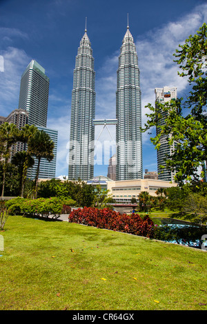 The Petronas Towers viewed from KLCC Park at twilight Stock Photo - Alamy