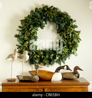 Christmas wreath on a rustic wooden front door or wall Stock Photo - Alamy