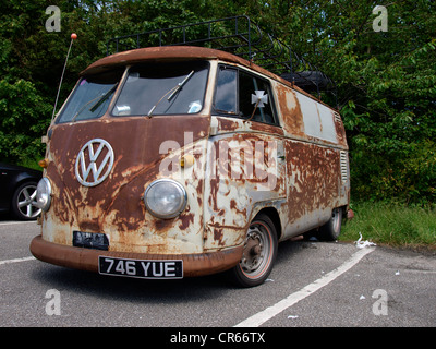 A vintage rat look Volkswagen camper van parked at the roadside i ...