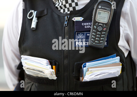 Metropolitan Police WPC woman officer in a Police station custody suite ...