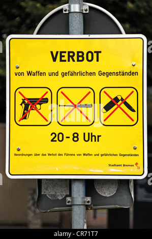 Prohibition sign in a park in Germany. Translation: Climbing the wall ...