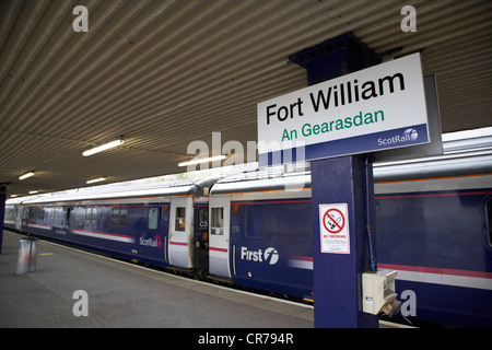 Fort William train station platform and name sign with ScotRail train ...