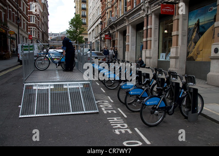 transport of TFL bikes loading unloading Stock Photo - Alamy