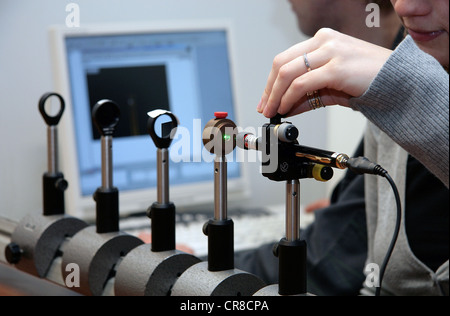Researchers of physics doing a science experiment in the lab Stock ...
