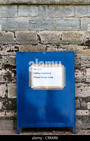 Sign warning "Danger - Risk of masonry falling" sign at the Balcombe ...