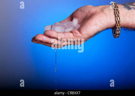 Hand Holding Melting Ice Cubes Stock Photo: 33990829 - Alamy