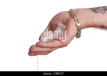 Hand Holding Melting Ice Cubes Stock Photo - Alamy