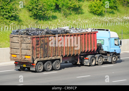 Unmarked scrap metal hgv lorry truck with articulated trailer loaded ...