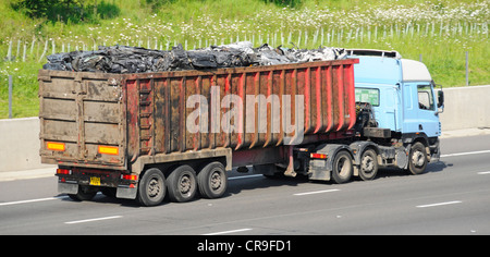 Unmarked scrap metal hgv lorry truck with articulated trailer loaded ...