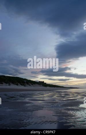 Bambrough Beach and castle Stock Photo - Alamy
