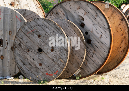 empty wooden cable drum at construction area Stock Photo - Alamy