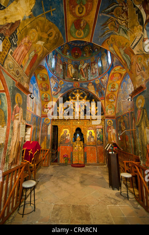 Byzantine frescoes in a painted barn-roofed Greek Orthodox church ...