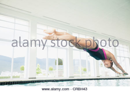 View of female swimmer diving in swimming pool Stock Photo: 55385832 ...