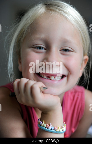 Portrait of caucasian girl of six years looking at camera on white ...