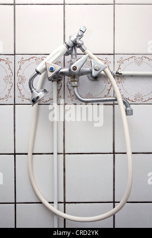 Rust inside old shower head being disassembled Stock Photo - Alamy