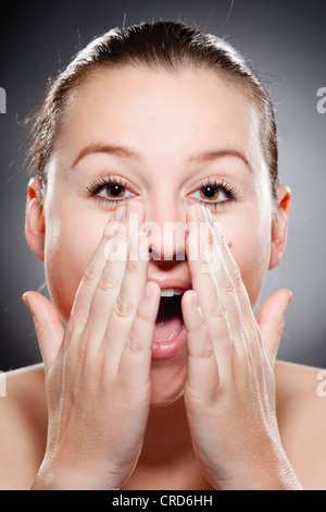 woman smiling with a malicious laugh looking insane rubbing hands Stock ...