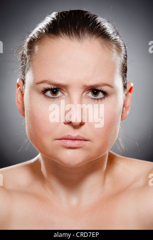 woman with strenuous face Stock Photo - Alamy