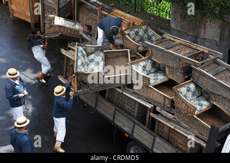 Toboggans or wicker sledges or baskets, Funchal, Madeira Stock Photo ...