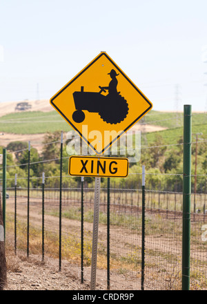 Tractor crossing sign Stock Photo - Alamy