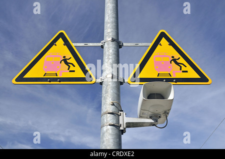 Platform with warning signs, warning of undertow and falling on the ...