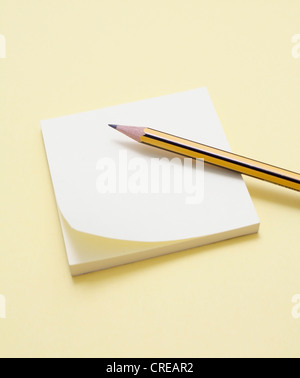 Pencil and Paper. Blank note pad awaiting ideas Stock Photo - Alamy