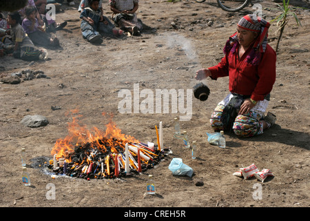 Mayan priests in ritual with Maya altar, burning candles and Stock ...