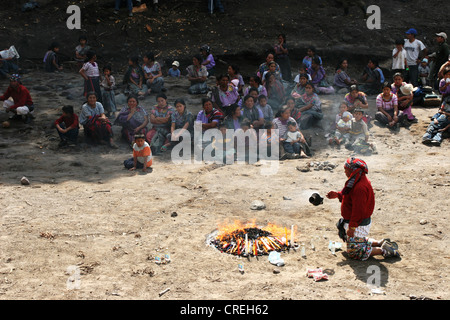 Mayan priests dancing and praying in ritual with Maya altar, burning ...